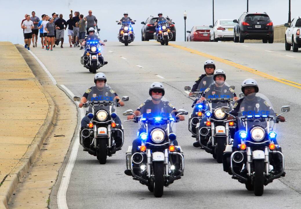 Law Enforcement Torch Run guides Flame of Hope through streets of ...