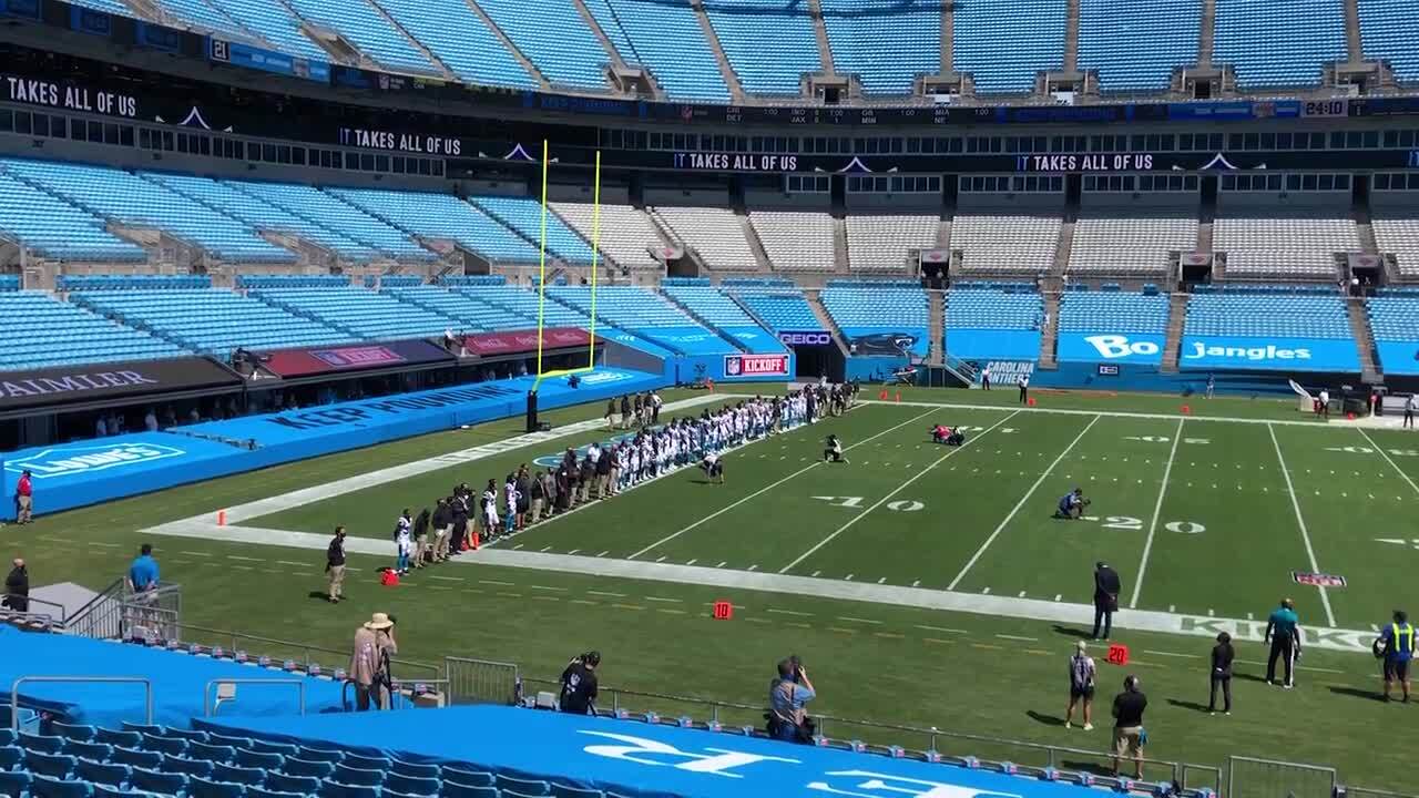 The Carolina Panthers stand in the endzone as Lift Every Voice and Sing ...