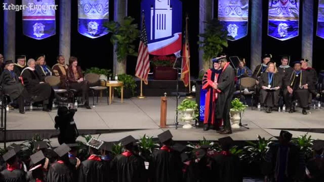Raw video: Graduate's "walk" brings cheers and smiles during CSU ...