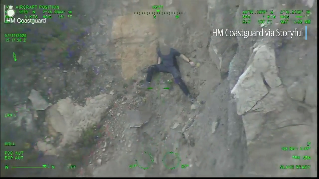 Video: Man stuck on cliffside rescued by helicopter in UK | Miami Herald