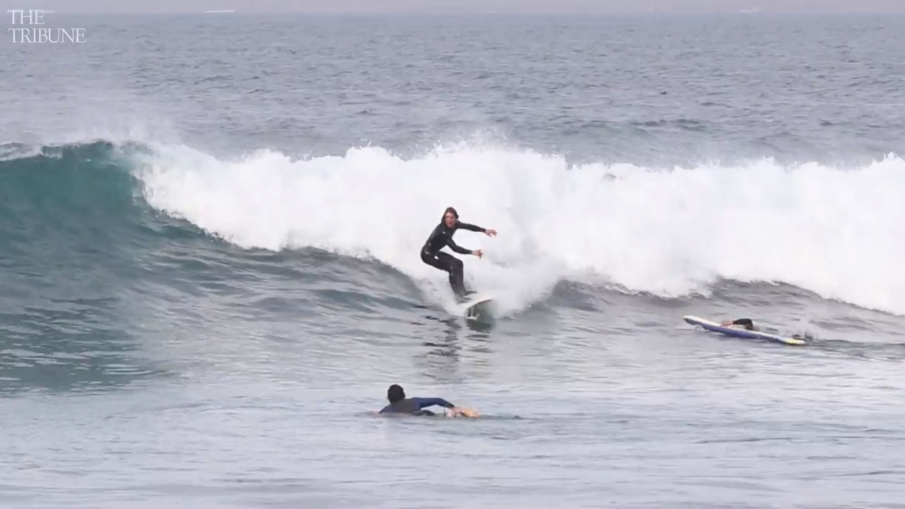 Surfers riding the waves north of Morro Rock, Morro Bay CA | San Luis ...