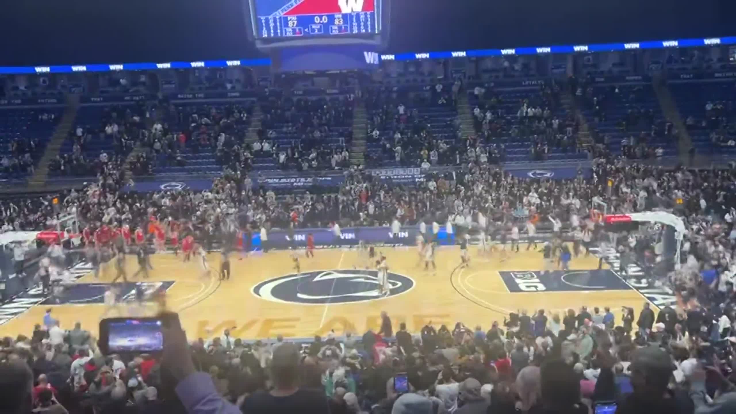 Penn State men's basketball fans storm the court after upset win over ...