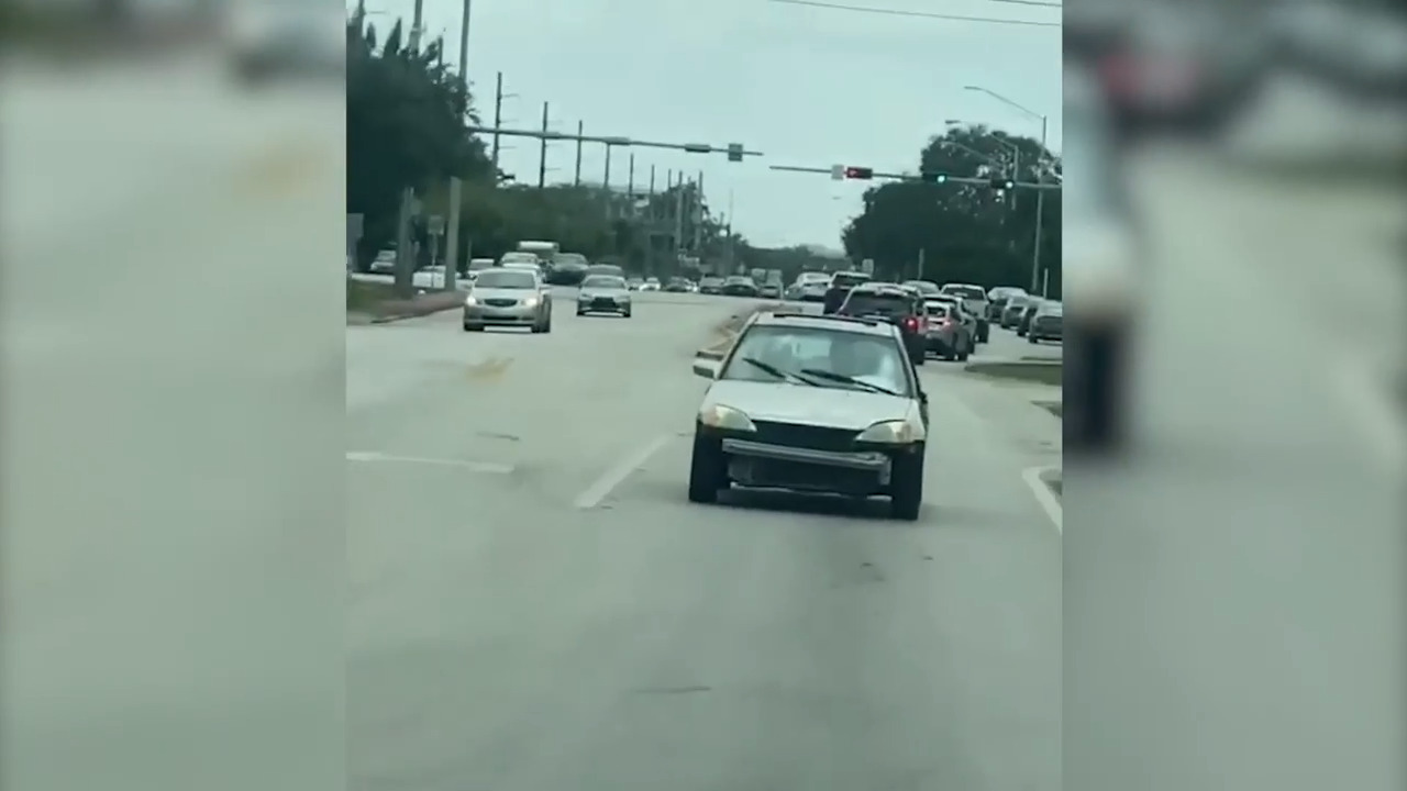 Watch a car casually drive backward down Florida road | Miami Herald