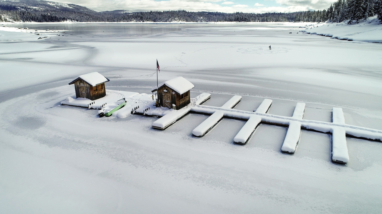 Drone video shows ice on Shaver Lake after cold winter storm ...