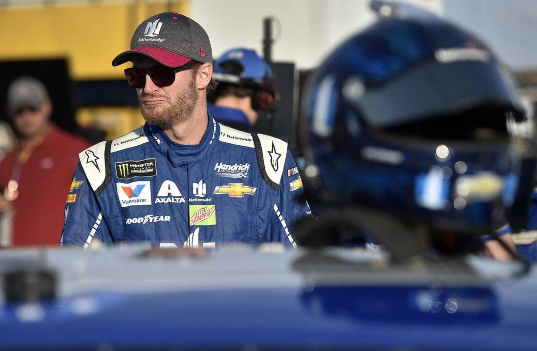 Royals manager Ned Yost congratulates Dale Earnhardt Jr. on his ...