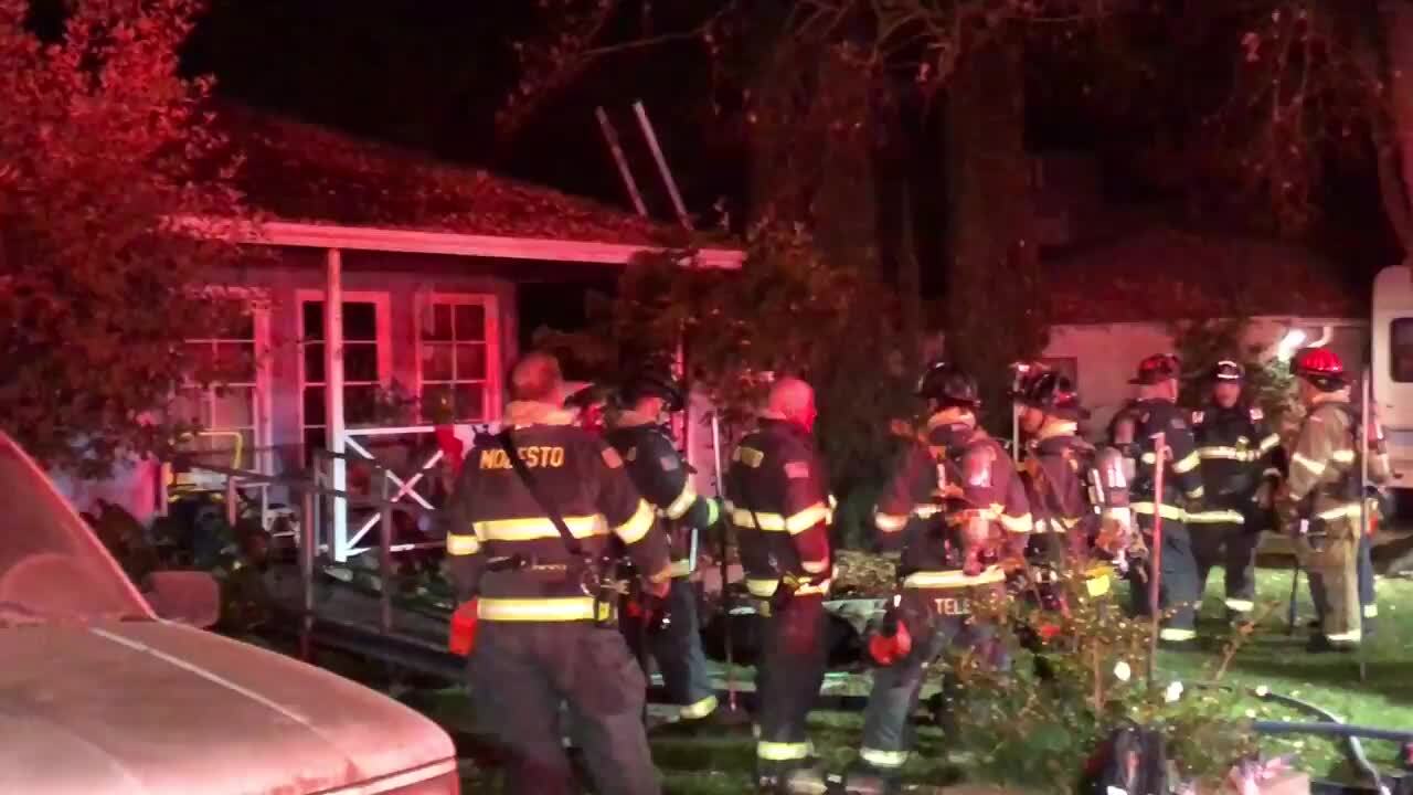 Watch crews respond to house fire in west-central Modesto | Modesto Bee