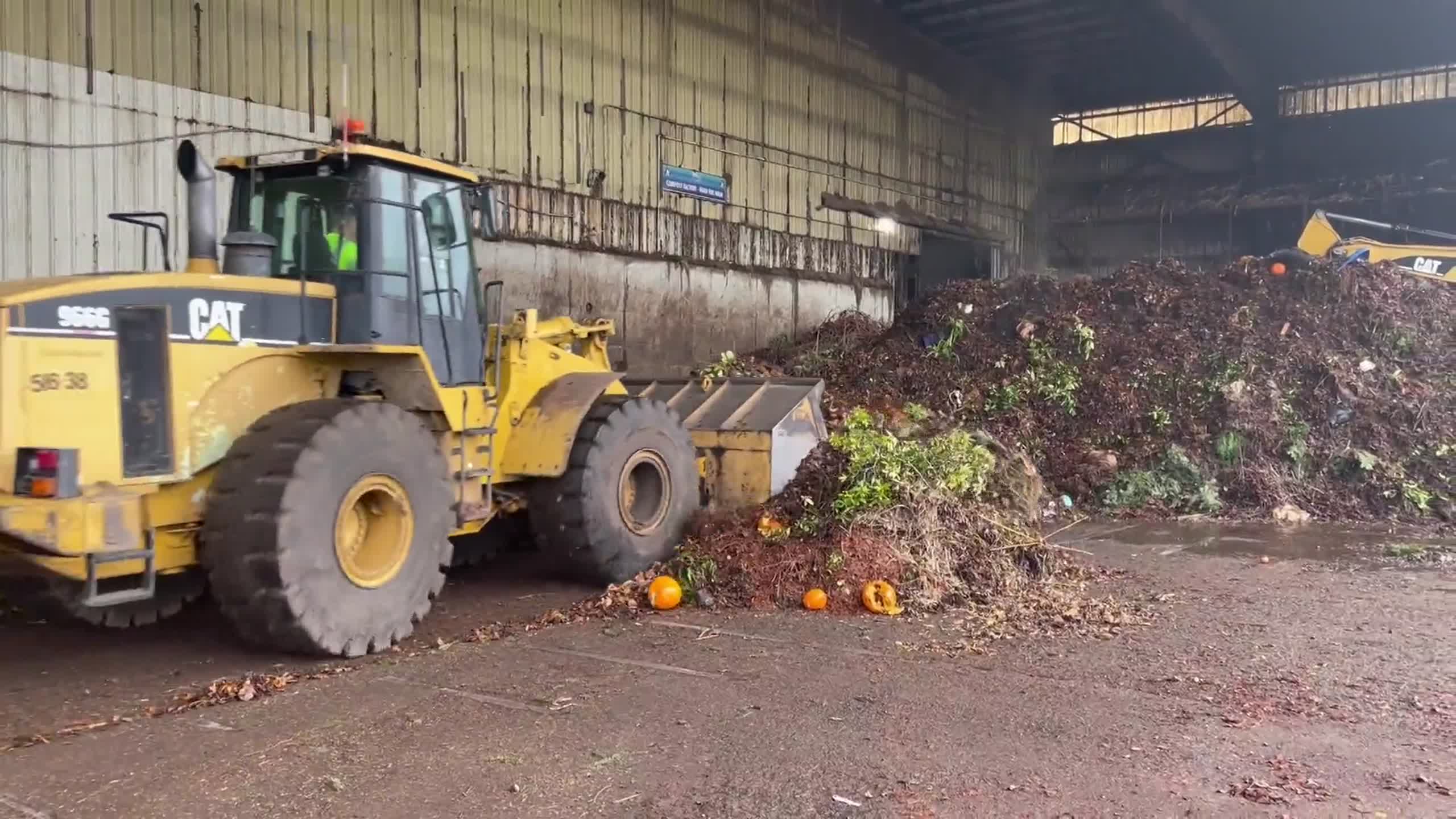 Take a look inside a facility that mixes yard waste and food waste to ...