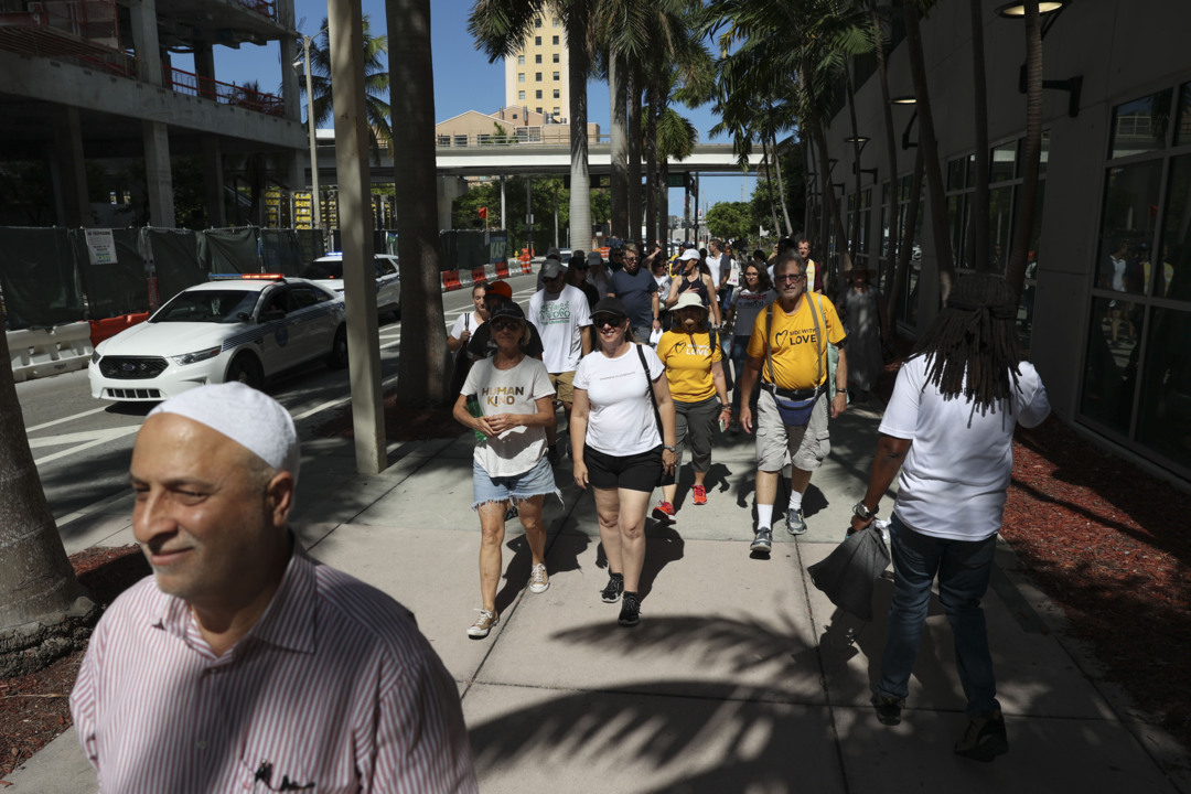Miami community groups march to promote unity and dismiss hate | Miami ...