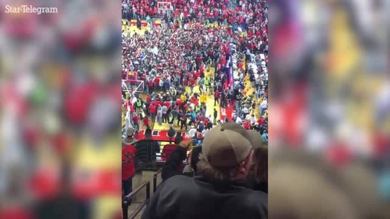 Texas Tech fans storm court, scuffle with West Virginia players ...