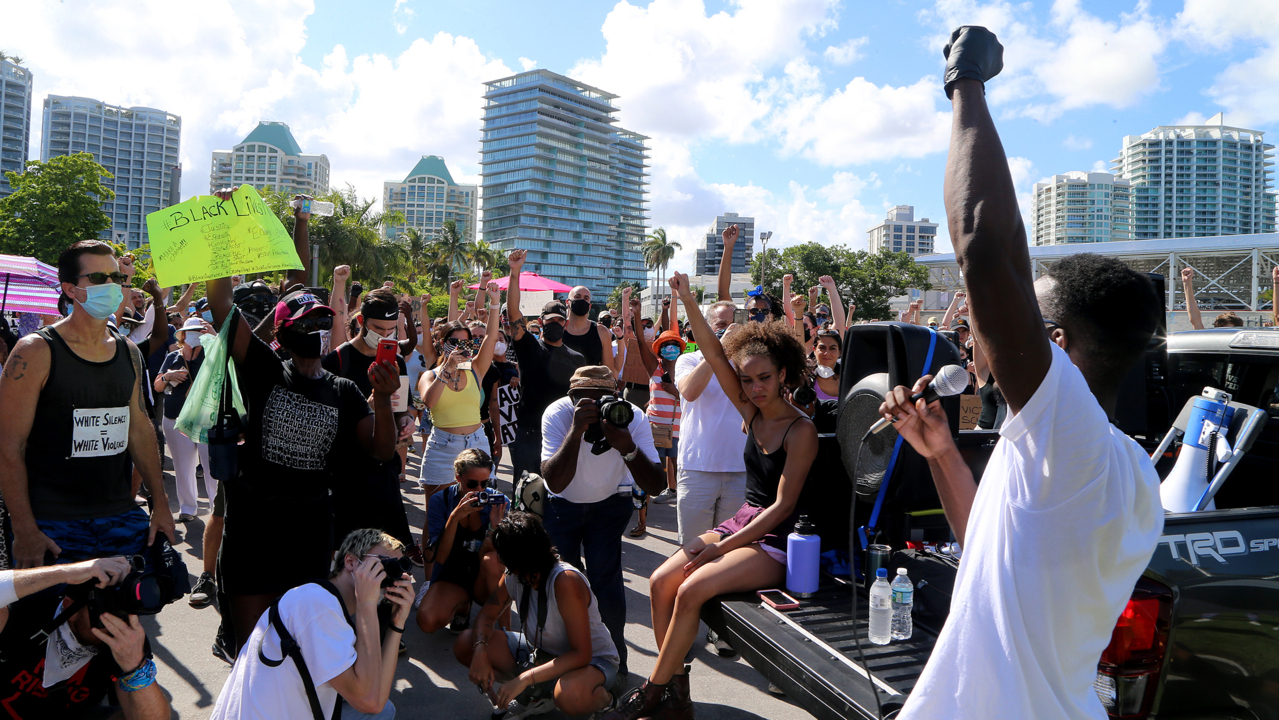 Protesters rally against police brutality in West Grove | Miami Herald