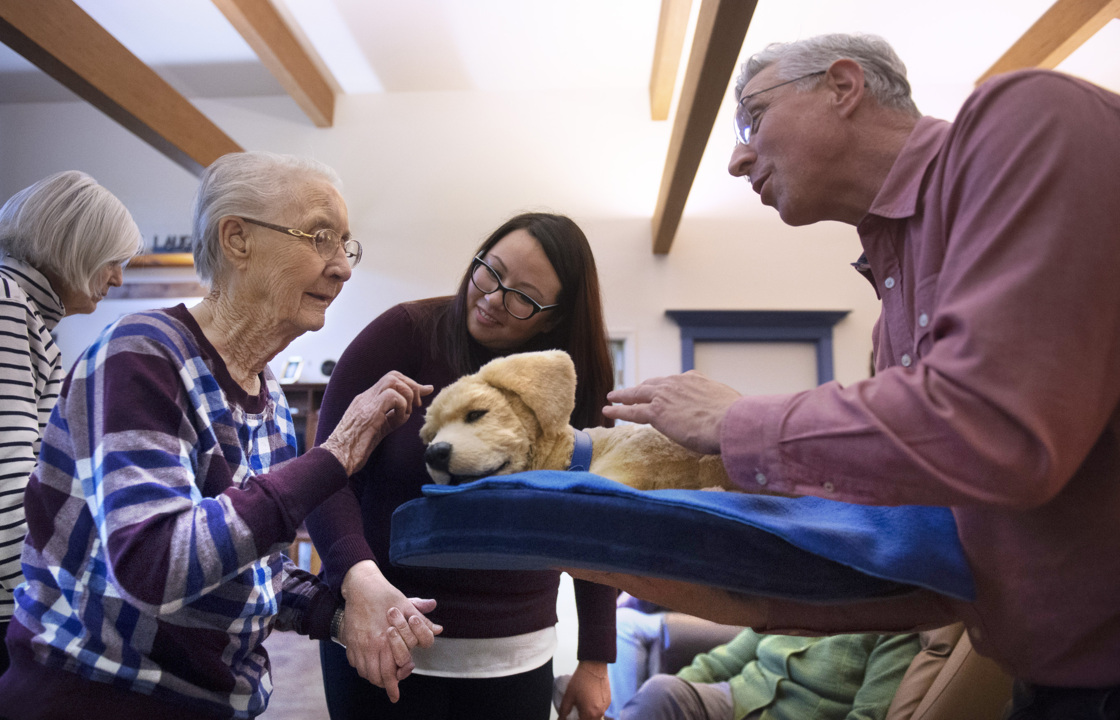 Tombot CEO Tom Stevens brought his robotic comfort dog, Jennie, to the ...