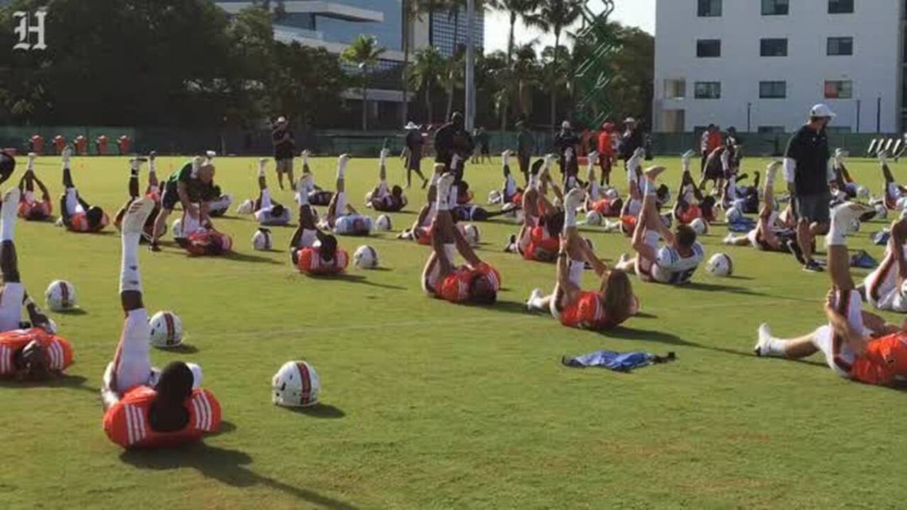 Canes stretch, then huddle | Miami Herald