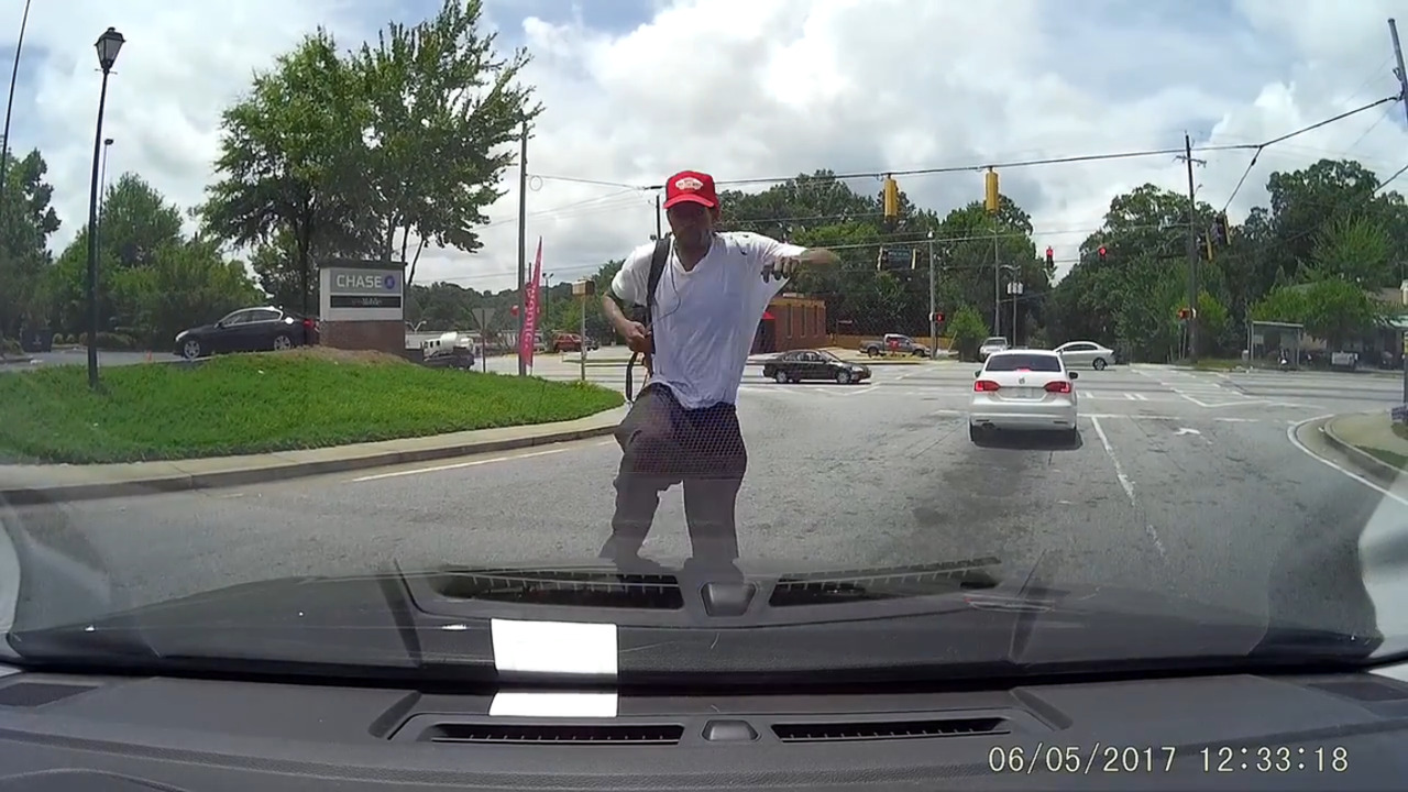 Man jumps on moving car and kicks in windshield in Atlanta | Hilton ...