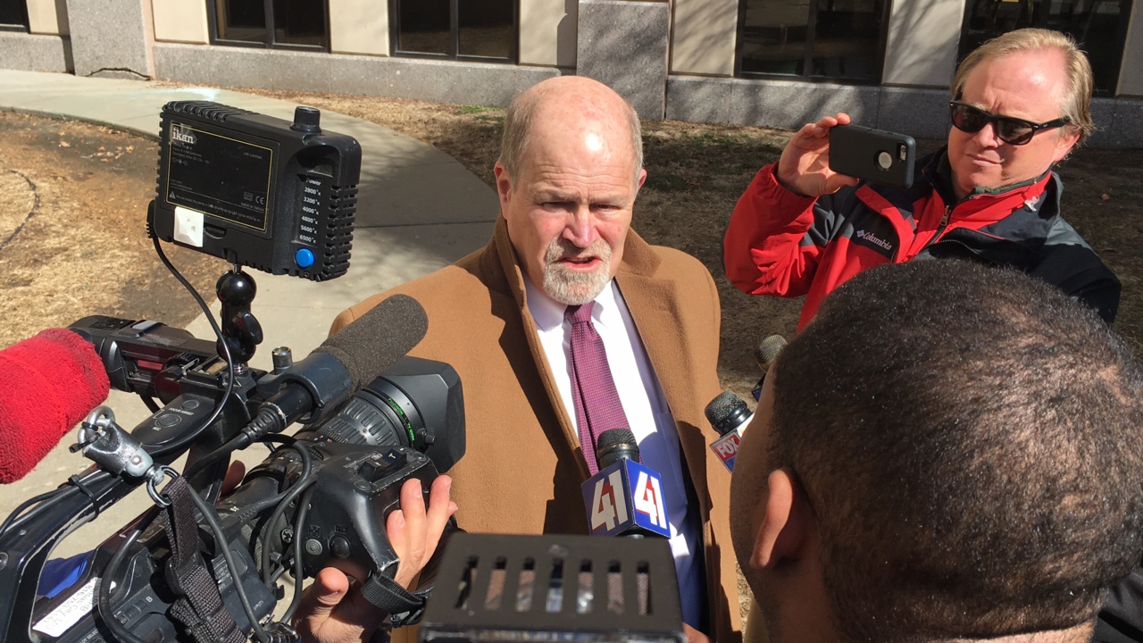 Attorney Carl Cornwell speaks after Schlitterbaun’s Jeff Henry makes ...
