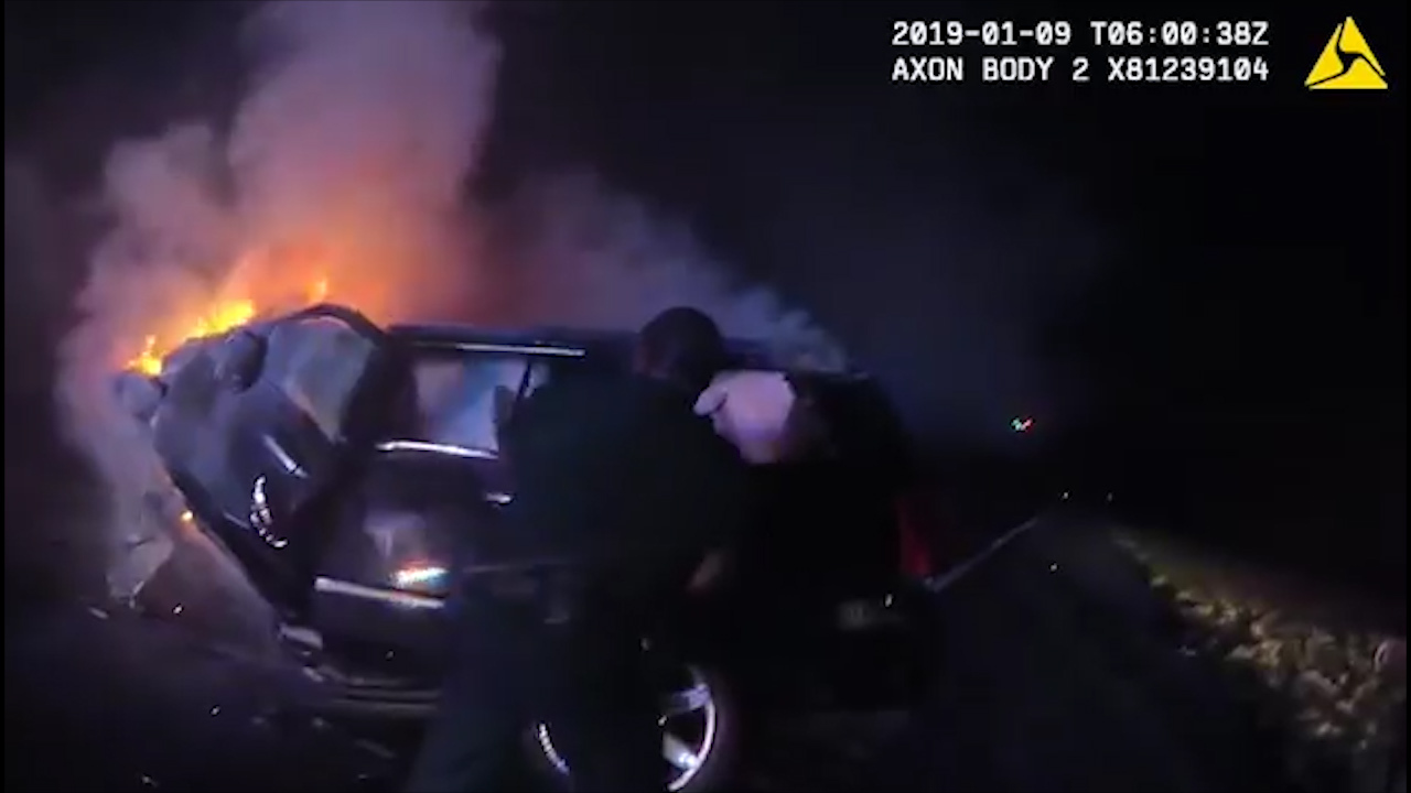 Officers save driver from car on fire after crash on Florida interstate ...