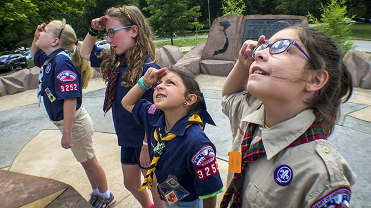 An all-girl Den of Cub Scouts worked on their advancement during their ...