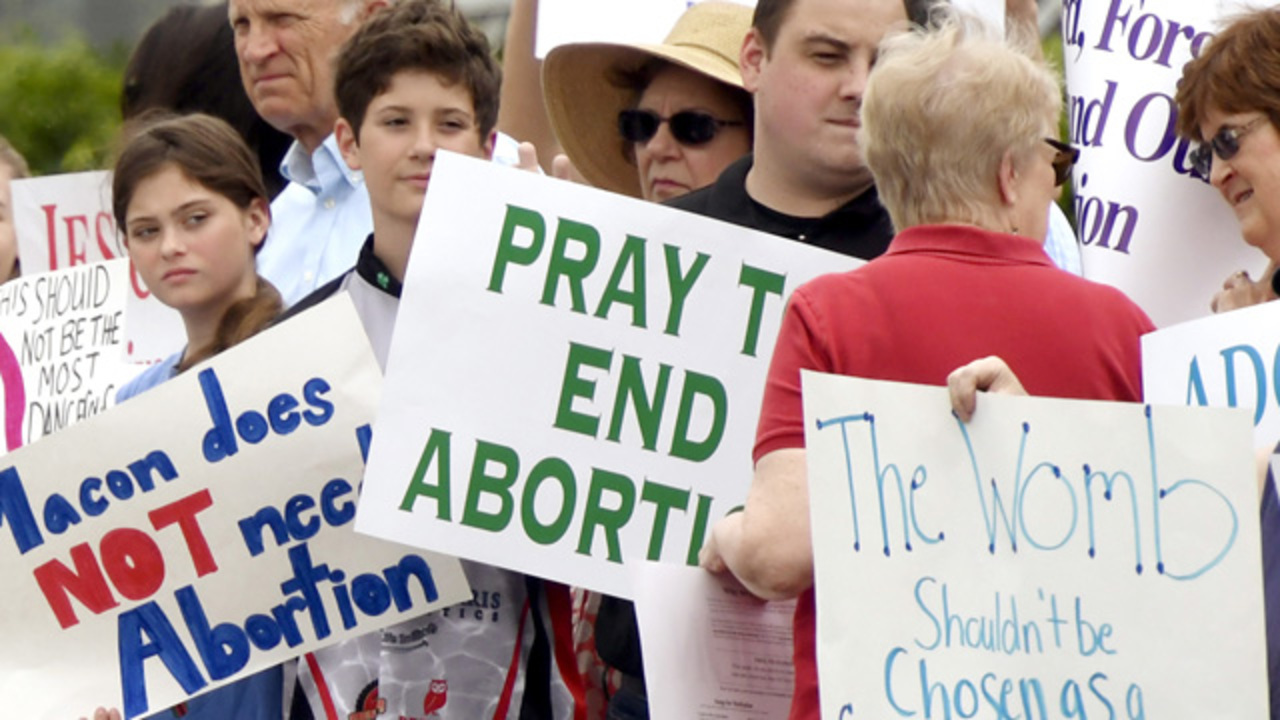 Pro-life protesters angry over approved abortion clinic in Macon ...
