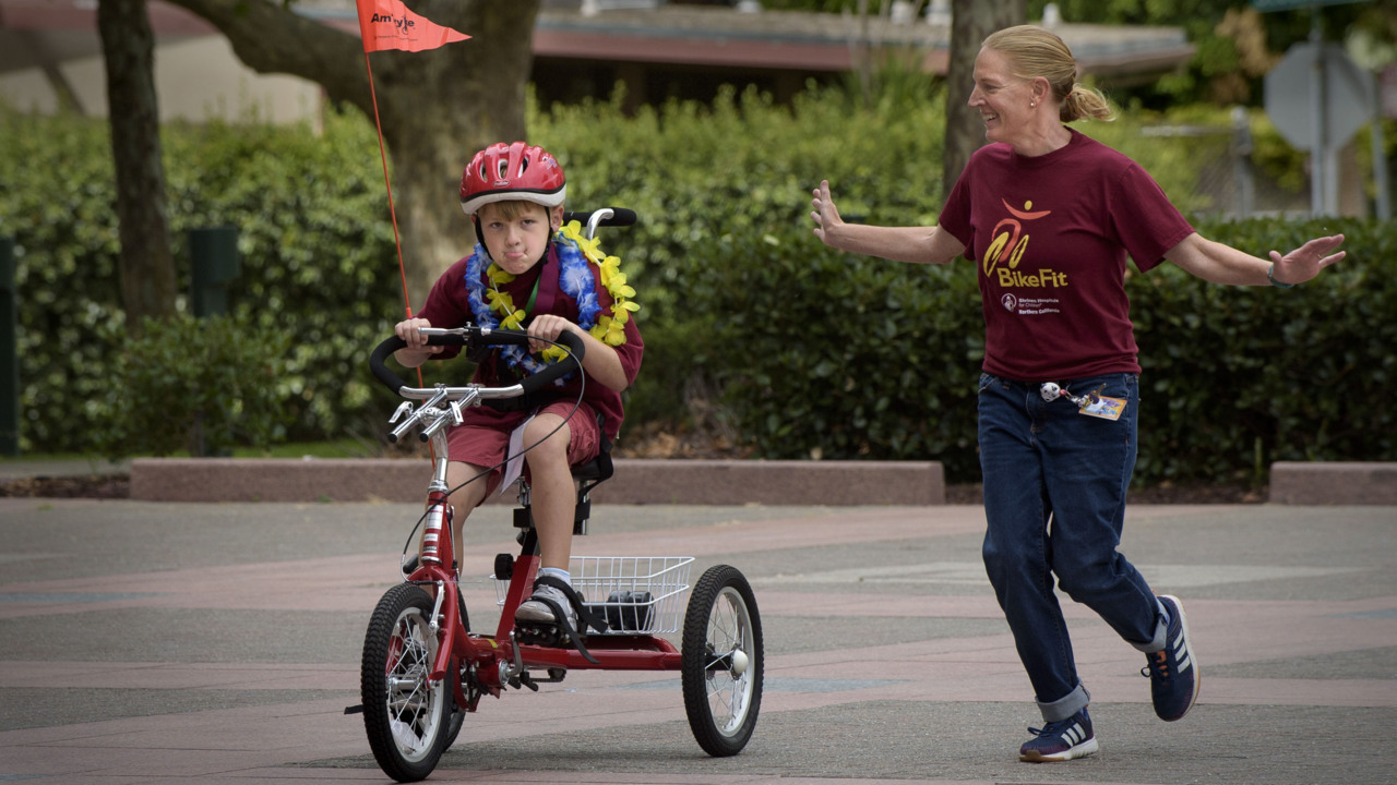 See kids ride adaptive bikes at Shriners Hospital for Children ...