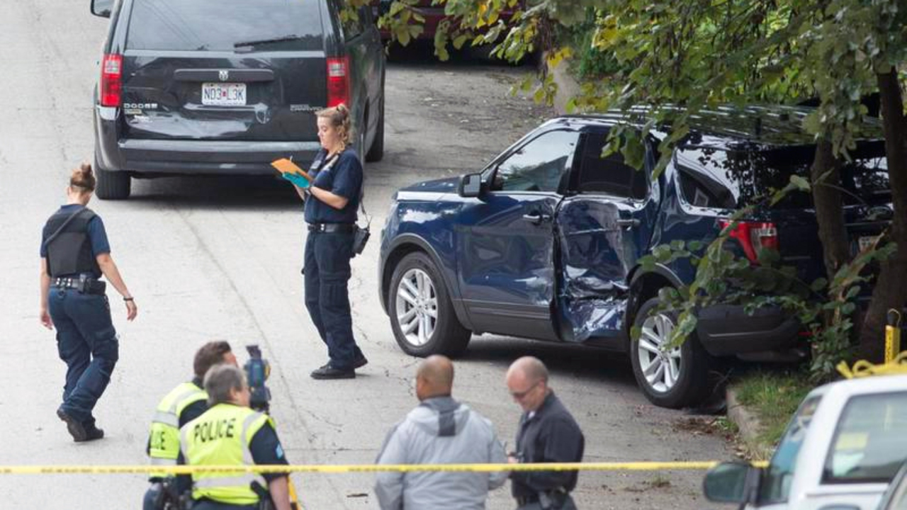 Fugitive shot as he allegedly drove toward KC officer to avoid arrest ...