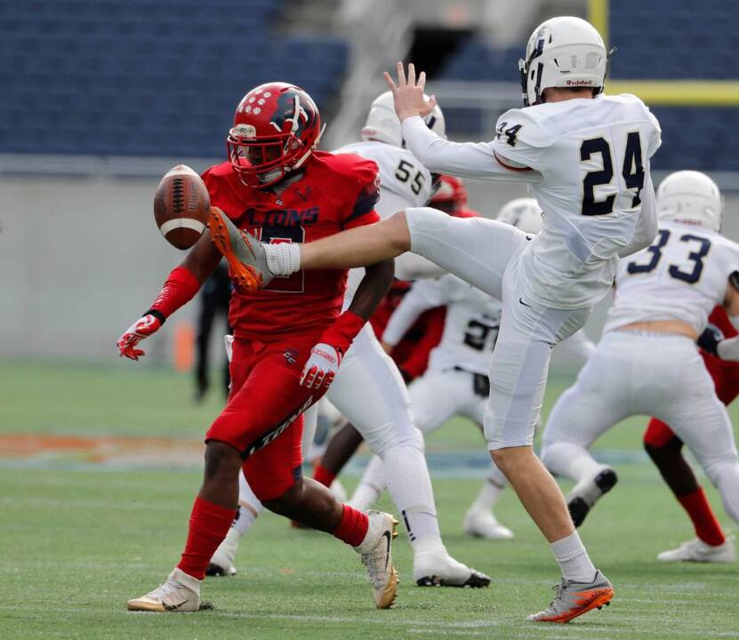 Champagnat Catholic School football coach Dennis Marroquin | Miami Herald