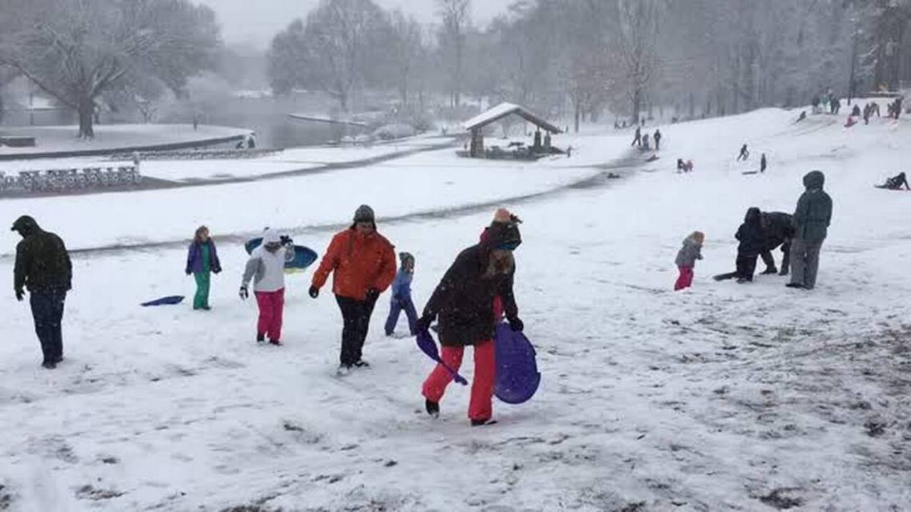 Sliding in snow at Freedom Park | Macon Telegraph