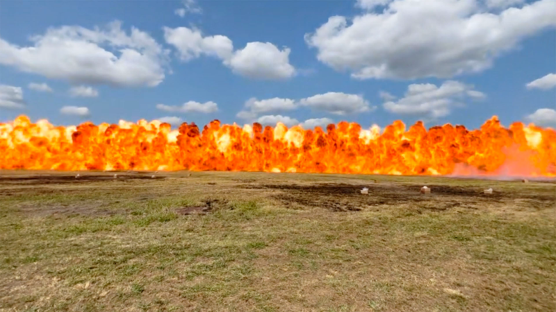Firewalkers International Pyro builds its 'Wall of Fire' during airshow ...