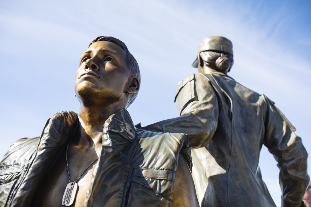 What is the meaning behind "sacred soil" and the new statue at the ...