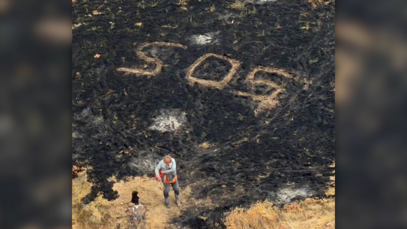 Rescuers reach stranded boater on fire-scorched California island ...