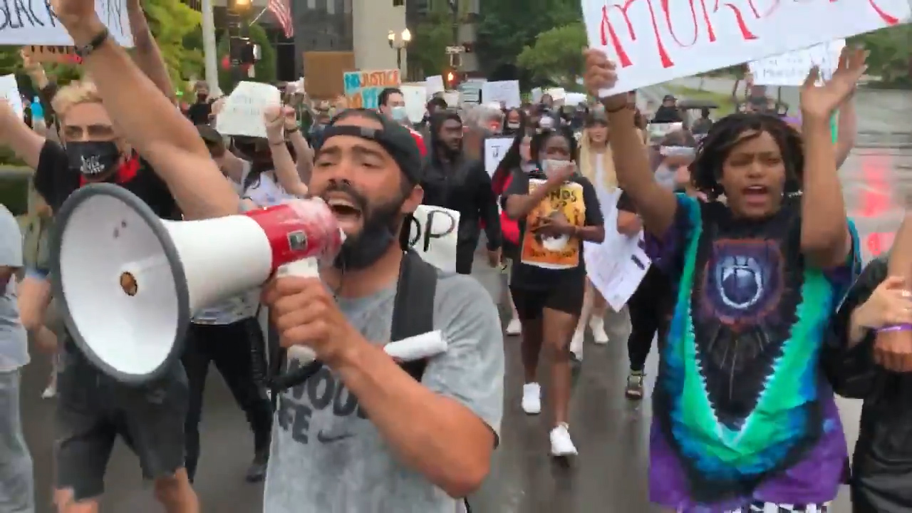 Rain doesn't stop 7th day of Lexington protests | Lexington Herald Leader
