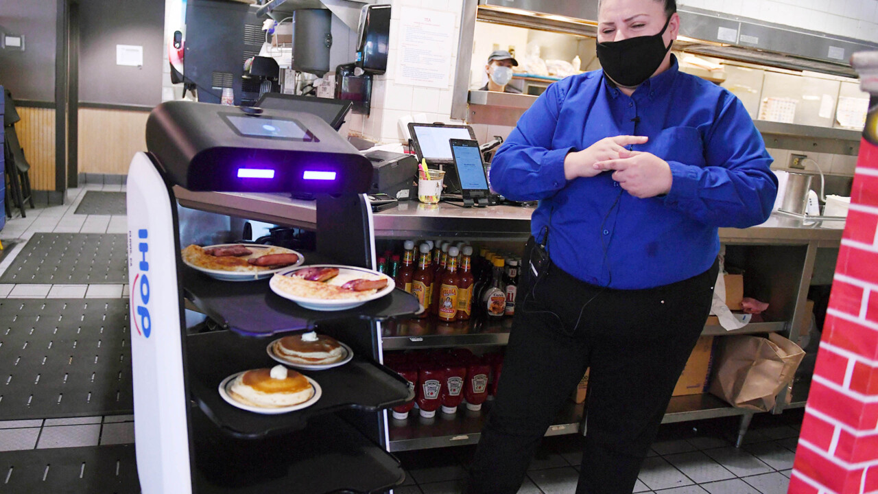 It's not the Terminator, but this little robot helps serve meals at a ...
