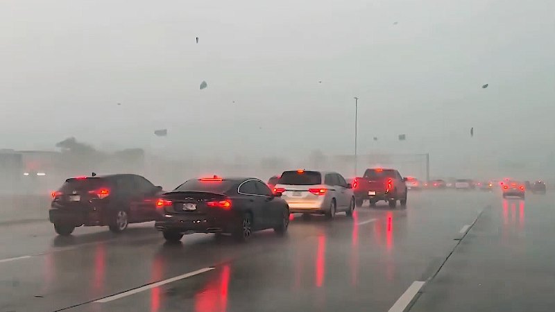 Indianapolis driver captures debris flying during tornado-warned storm ...