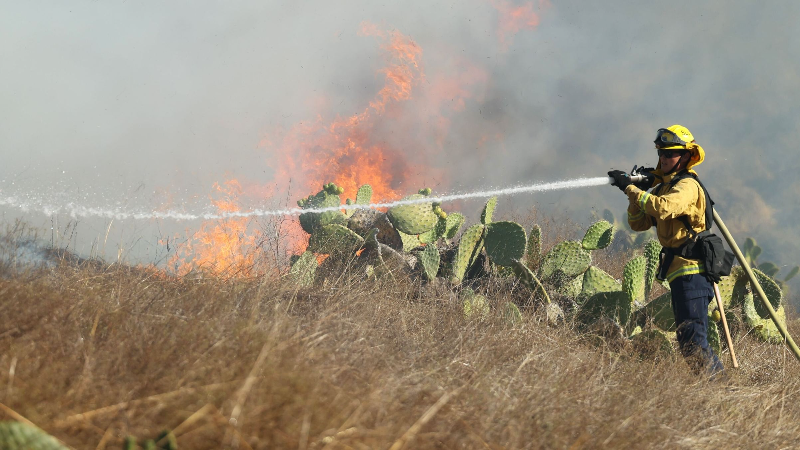 Raw video: Evacuations ordered as fire burns hillside near SLO High ...