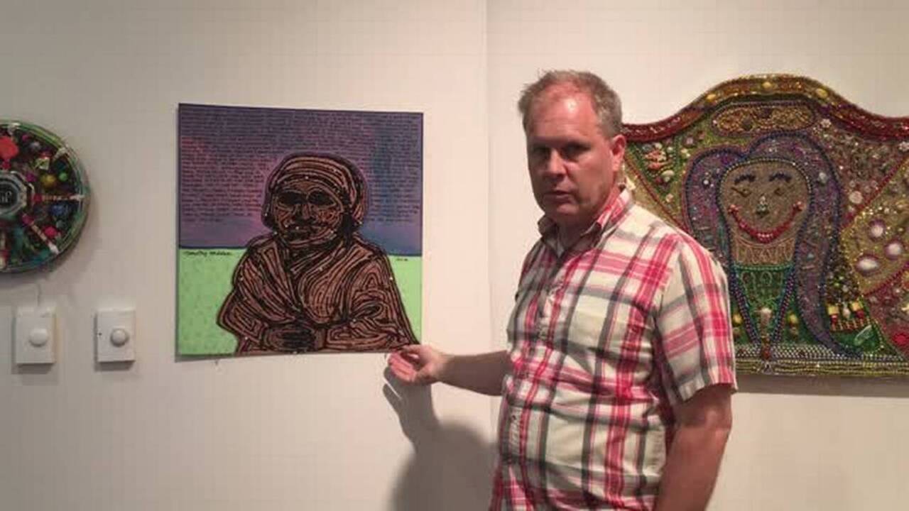 Timothy Hedden explains his exhibit at the Tubman | Macon Telegraph