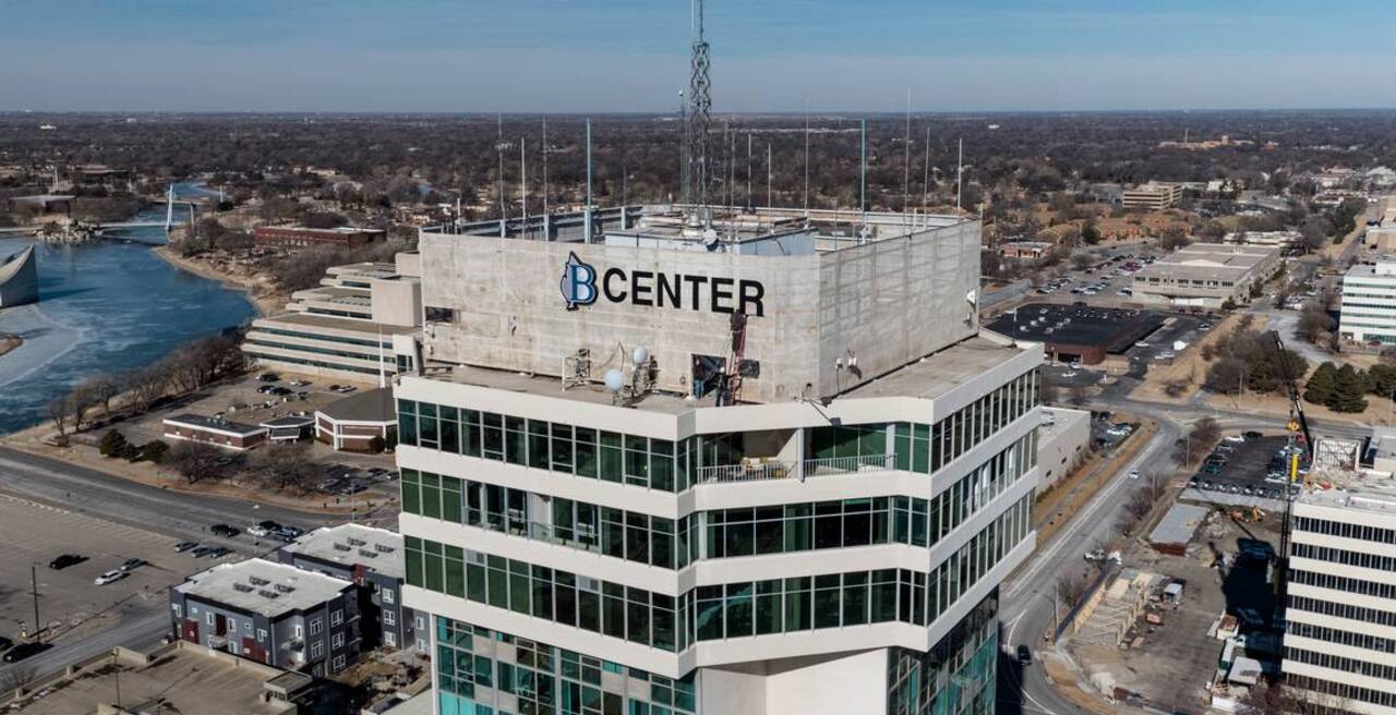 Take a flight around Wichita’s Garvey Center as new sign is put in ...