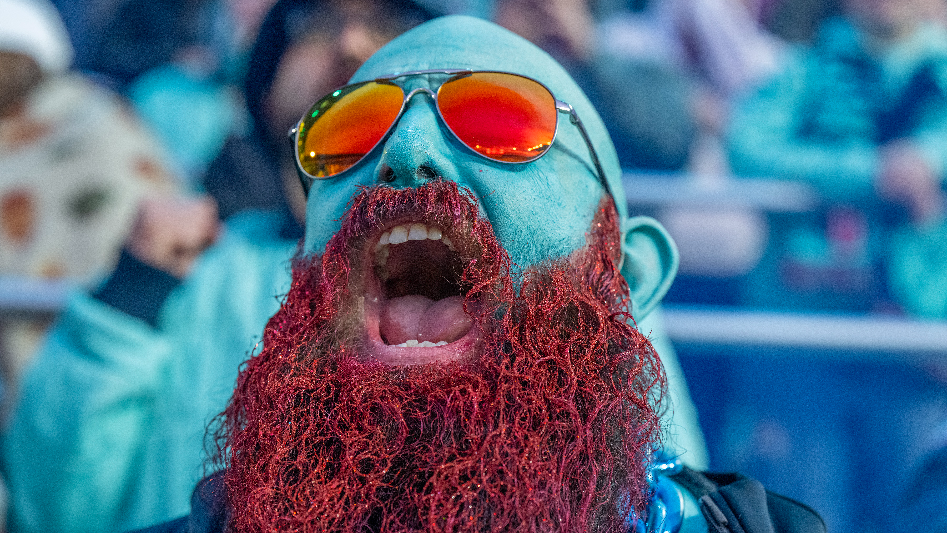 Meet the teal-painted super fan with a sparkly red beard front row at ...