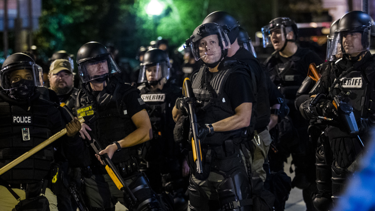 Riot police arrest 5 peaceful Andrew Brown protesters amid curfew ...