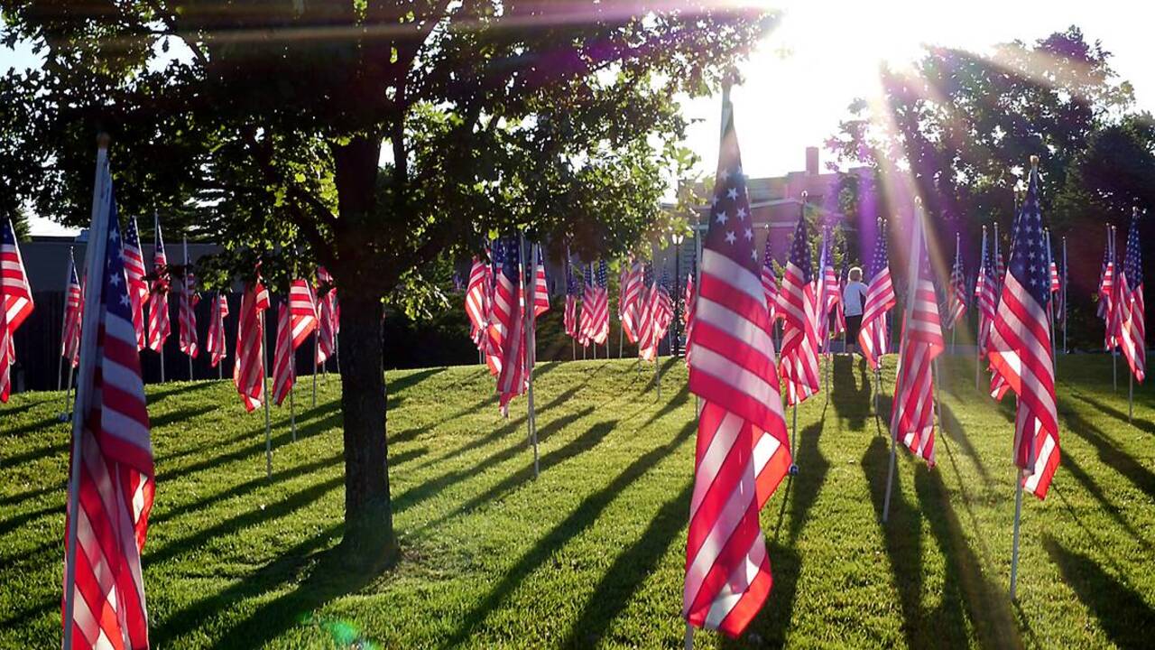 Volunteers install flags in no time at all ahead of Flags 4 Freedom ...
