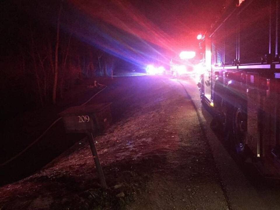 Firefighters working on house fire in OFallon IL near St Louis MO ...