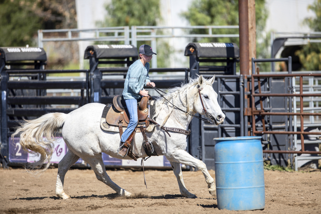Cancer survivor gets wish to learn barrel racing with Cal Poly Rodeo ...