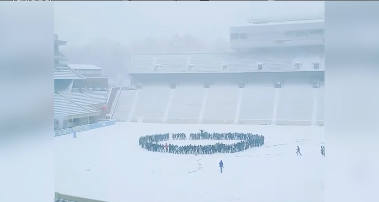 UNC students celebrate a snow day in Kenan Stadium | Charlotte Observer