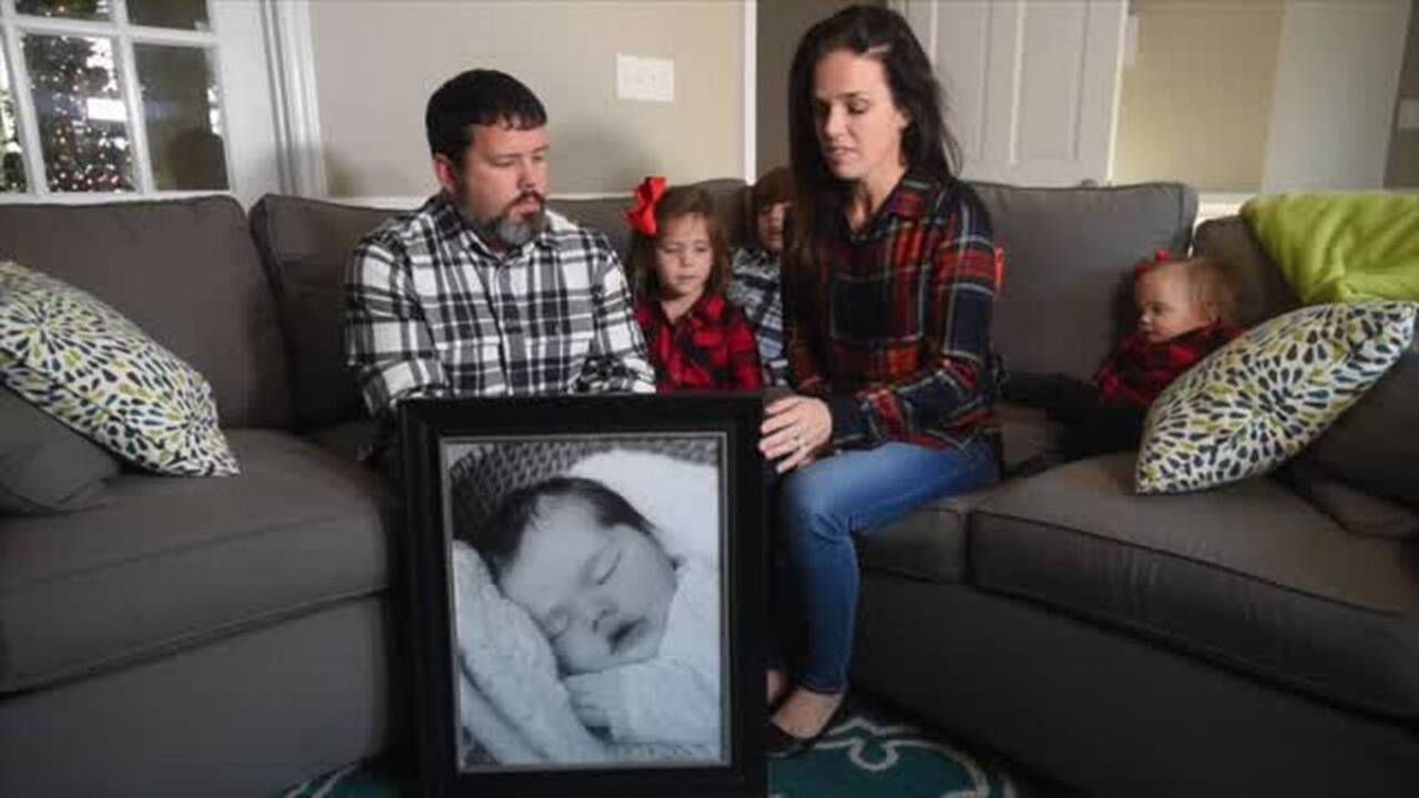 Stillborn daughter's photo included in family portraits | Raleigh News ...