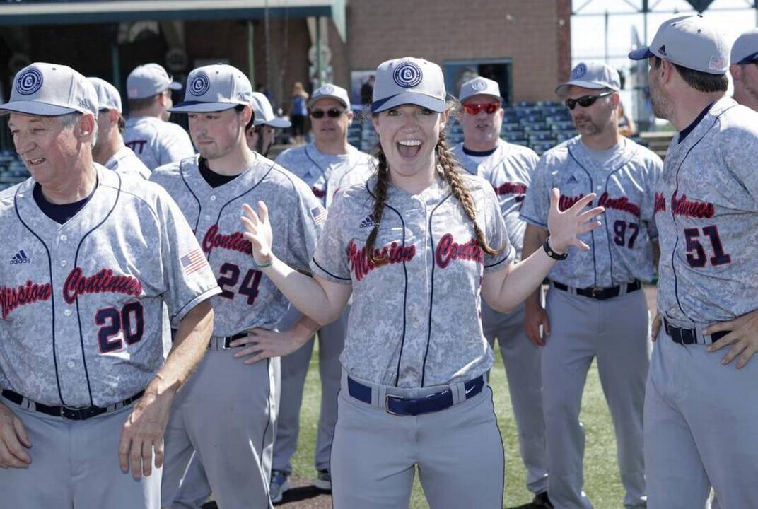 She's 26 and part of a milestone in marathon baseball history ...